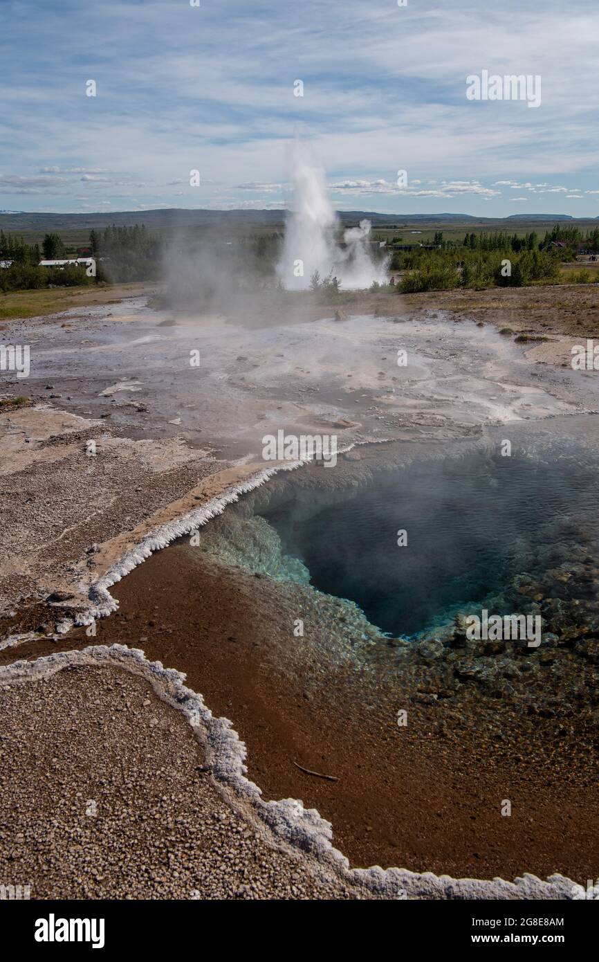 Thermal spring and eruption Geysir Strokkur, geothermal area Haukadalur ...
