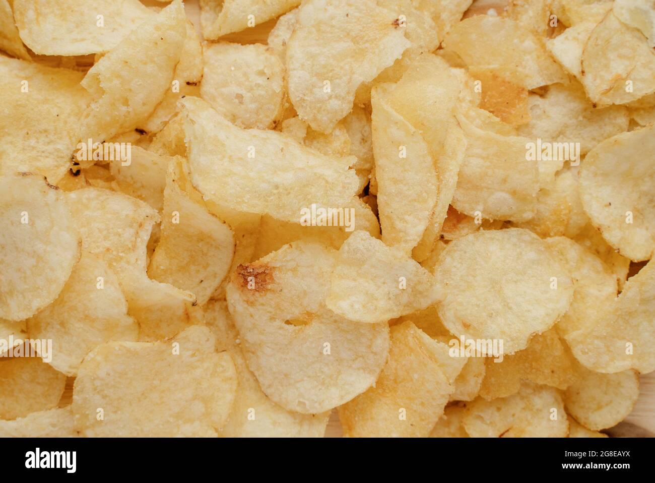 Potato chips close-up background Stock Photo - Alamy