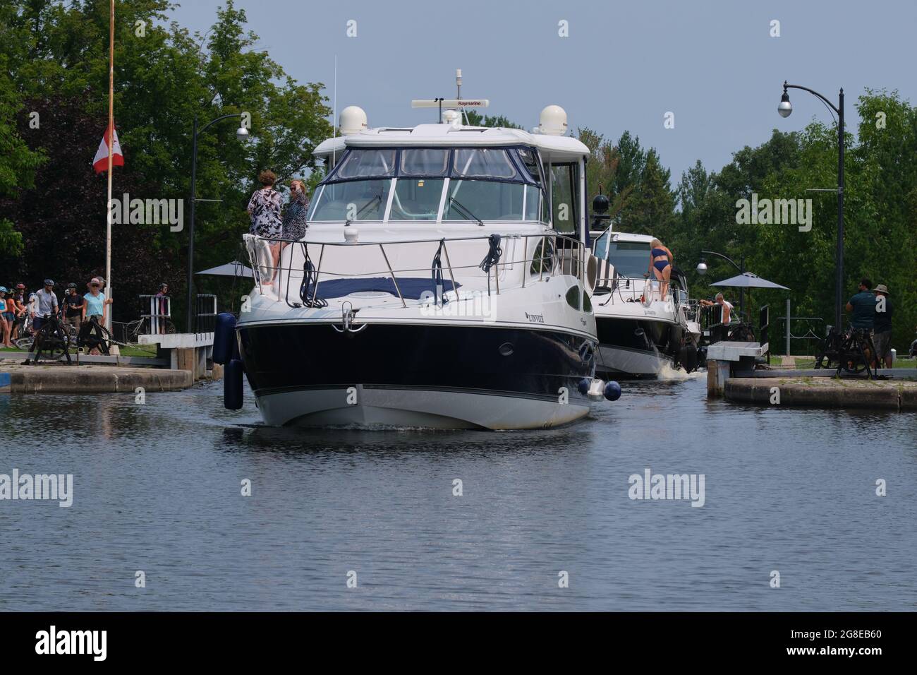 large Yacht boat coming out of the Hartwells Locks on Rideau Canal, in ...