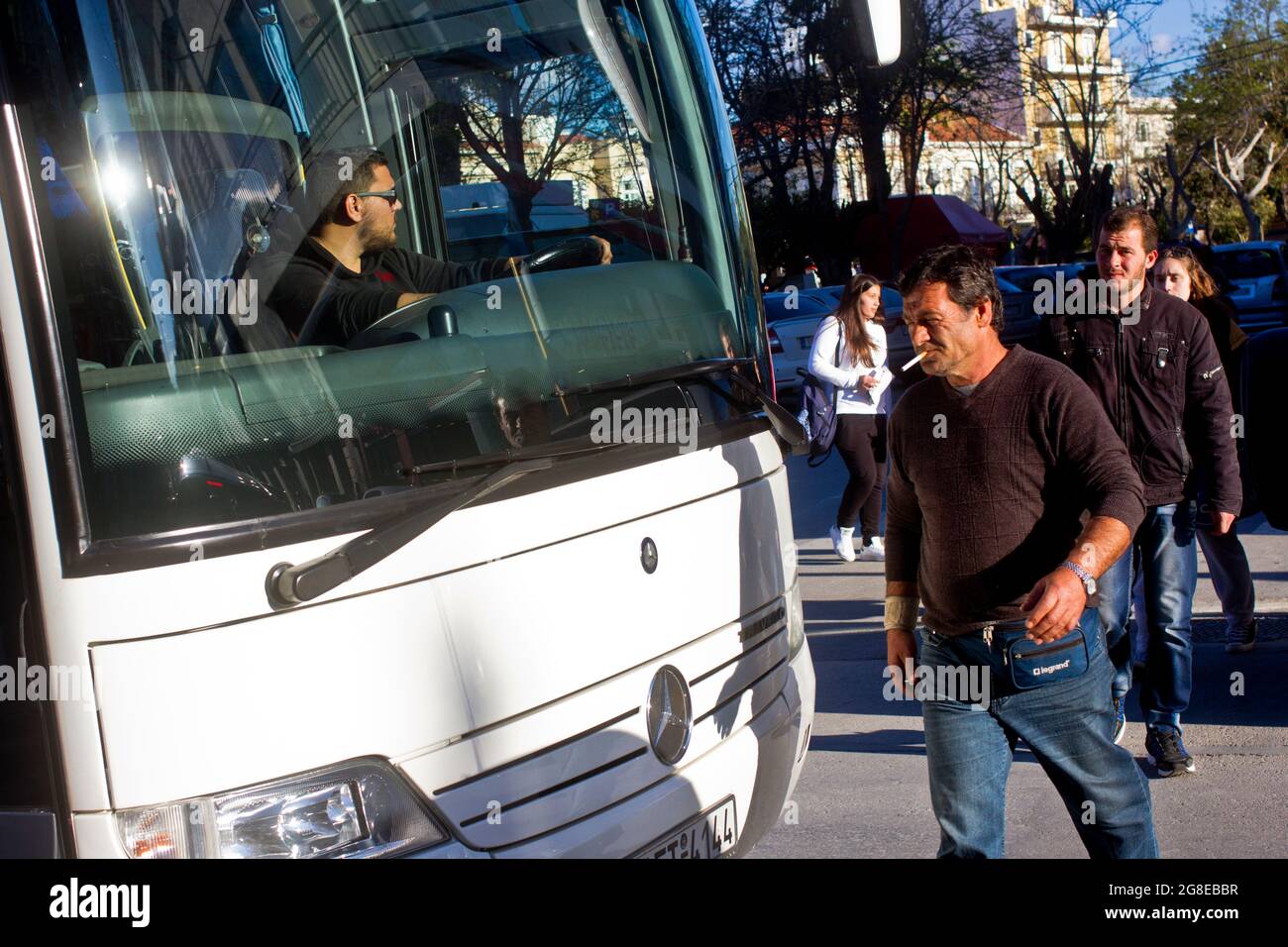 Driver of a tourist bus on the island of Crete, Greece Stock Photo - Alamy