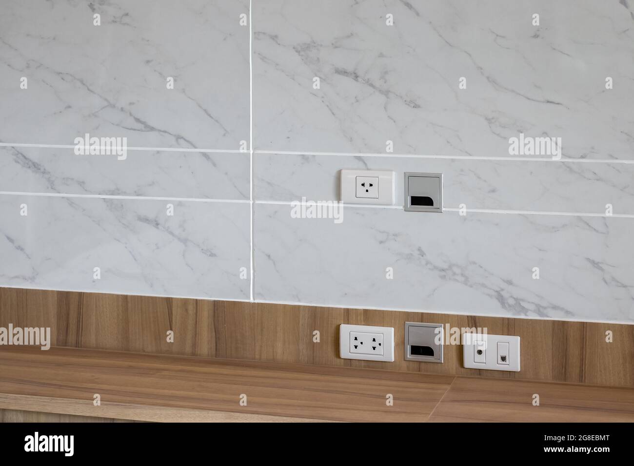 Power outlet on White Marble Background Stock Photo - Alamy