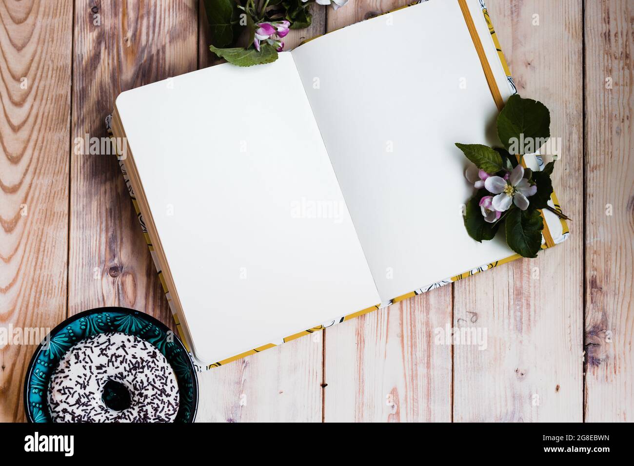 Open notebook on wooden background mock-up. Empty sketchbook, ideas ...