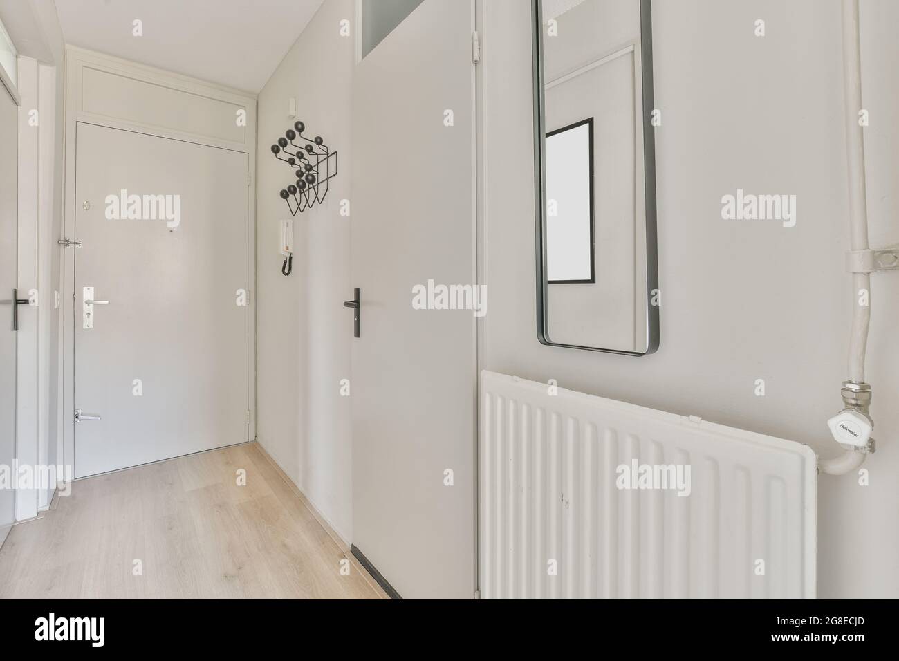 A long empty corridor designed in minimalistic style Stock Photo - Alamy