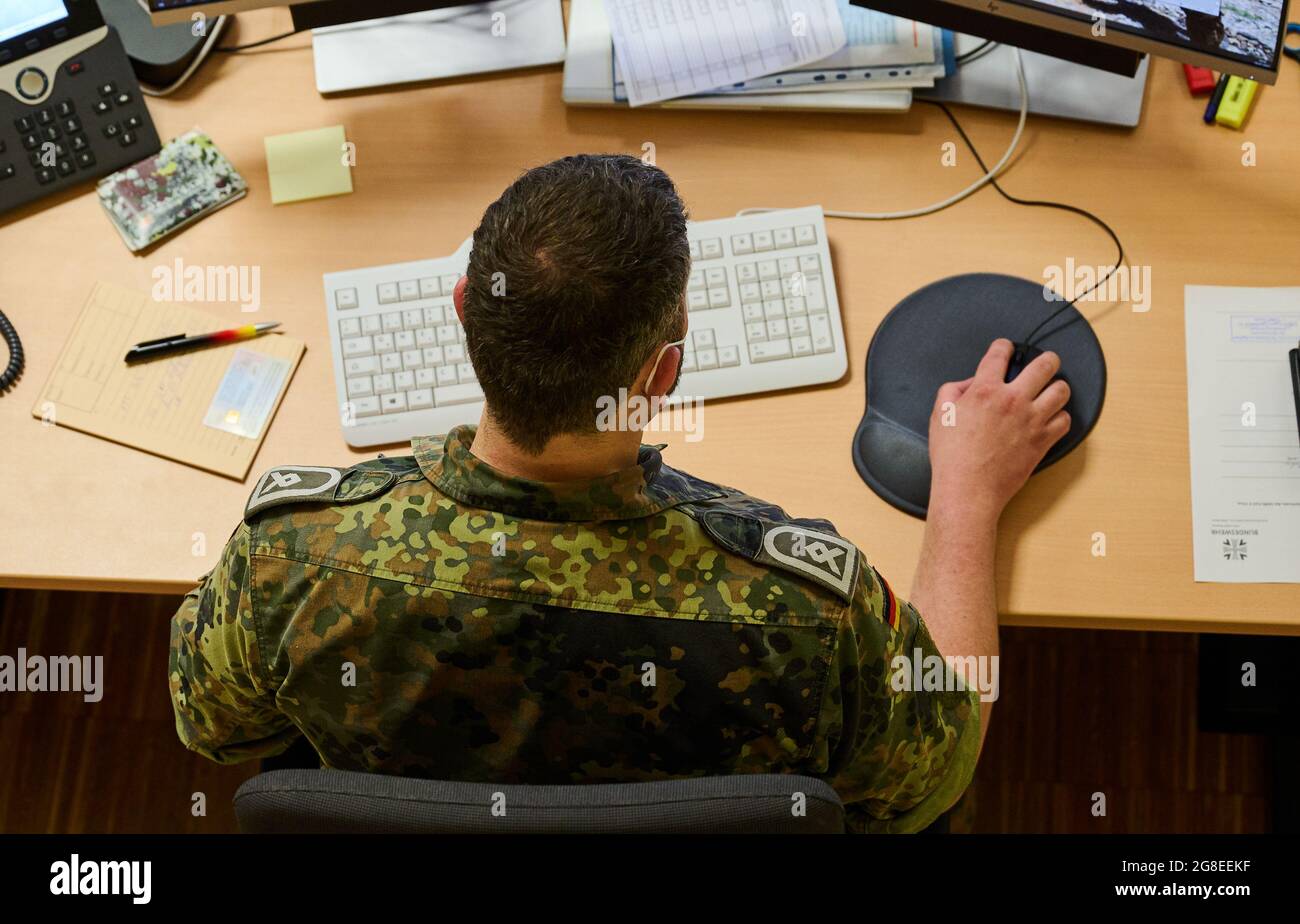 Berlin, Germany. 19th July, 2021. A first sergeant and employee in the ...