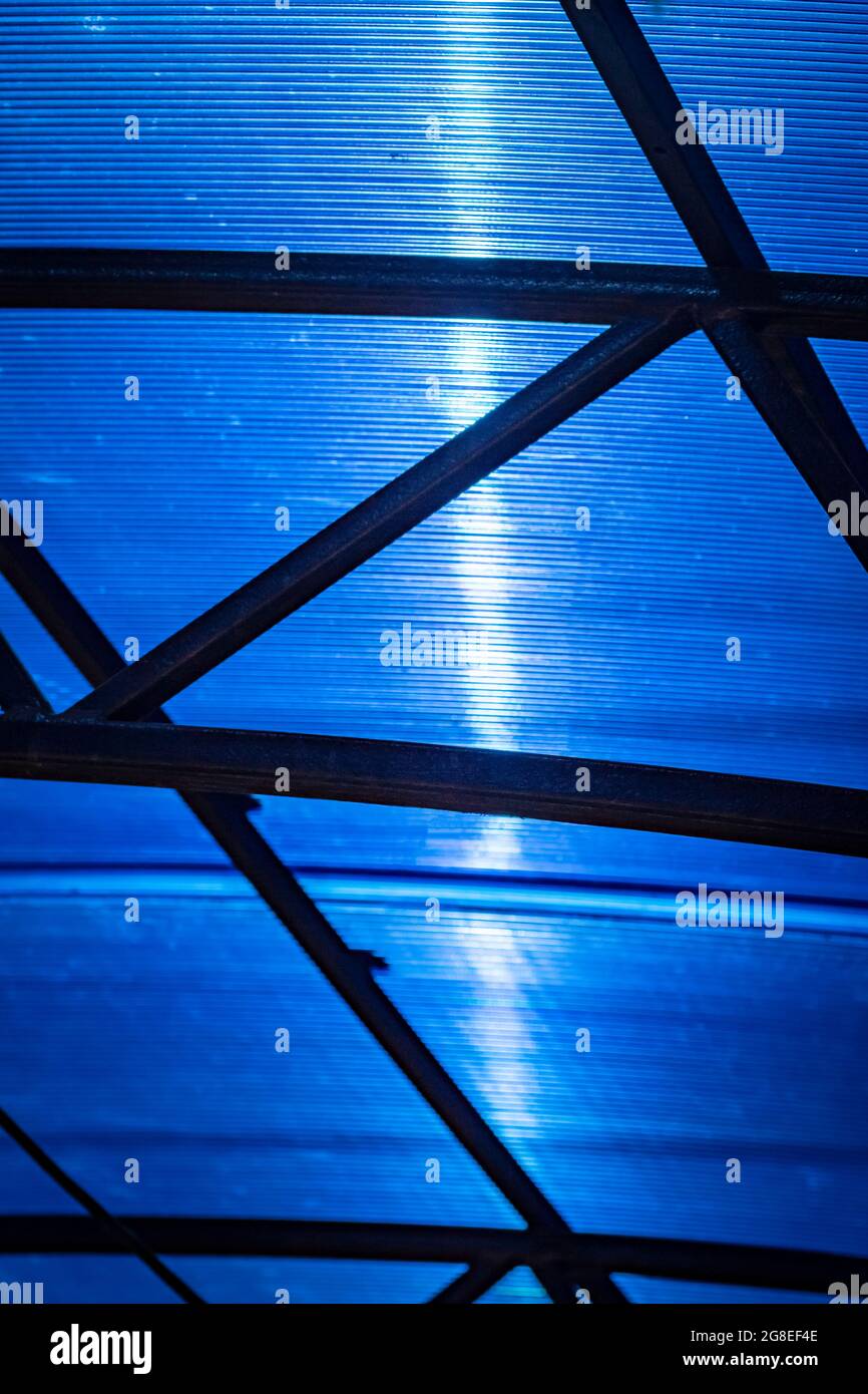 Blue polycarbonate canopy in the backyard of a private house Stock ...