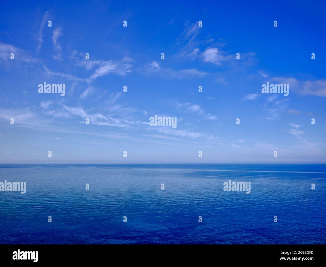Blue Sky and Blue Sea Stock Photo - Alamy