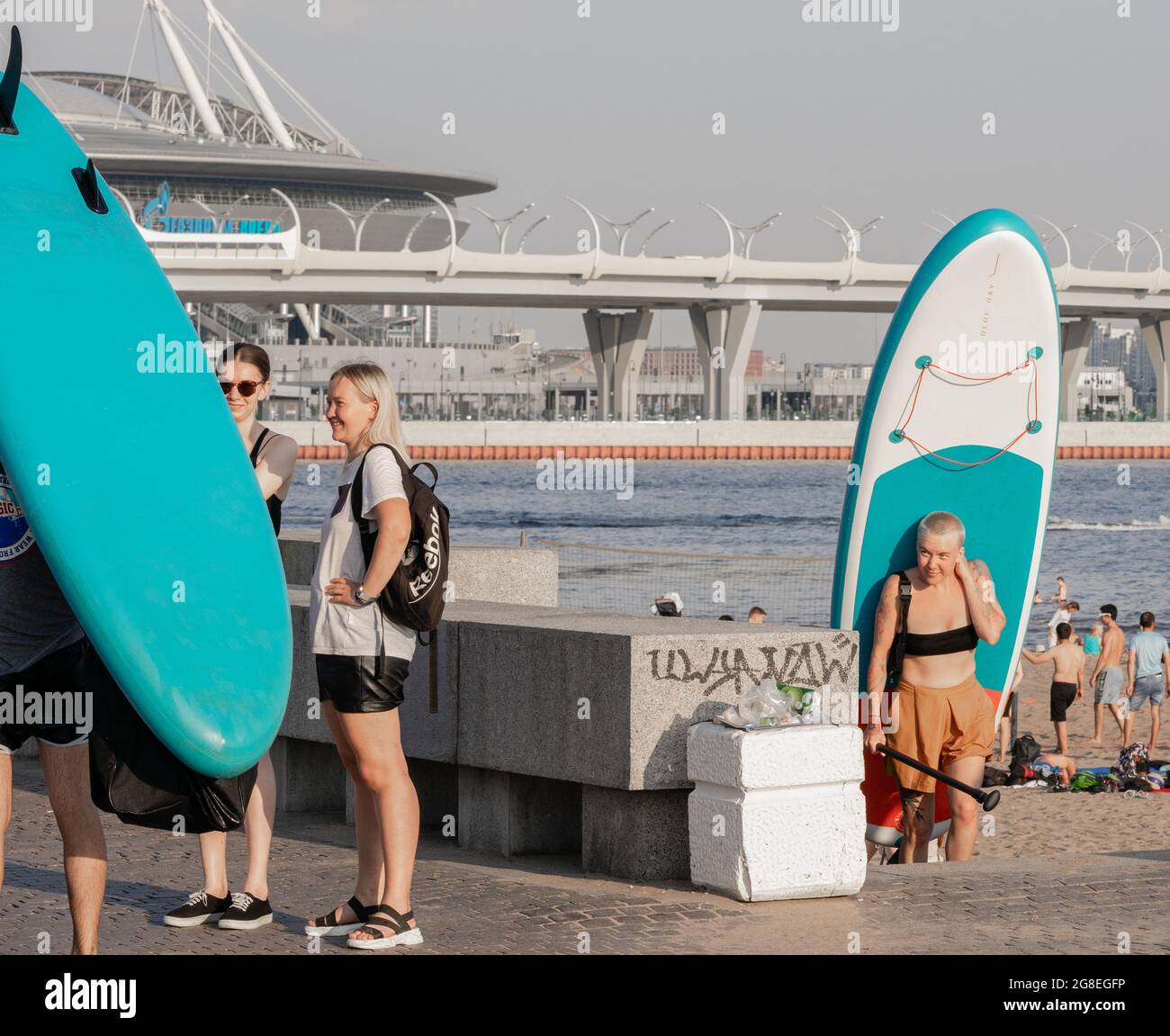 Woman carries body board hi-res stock photography and images - Alamy