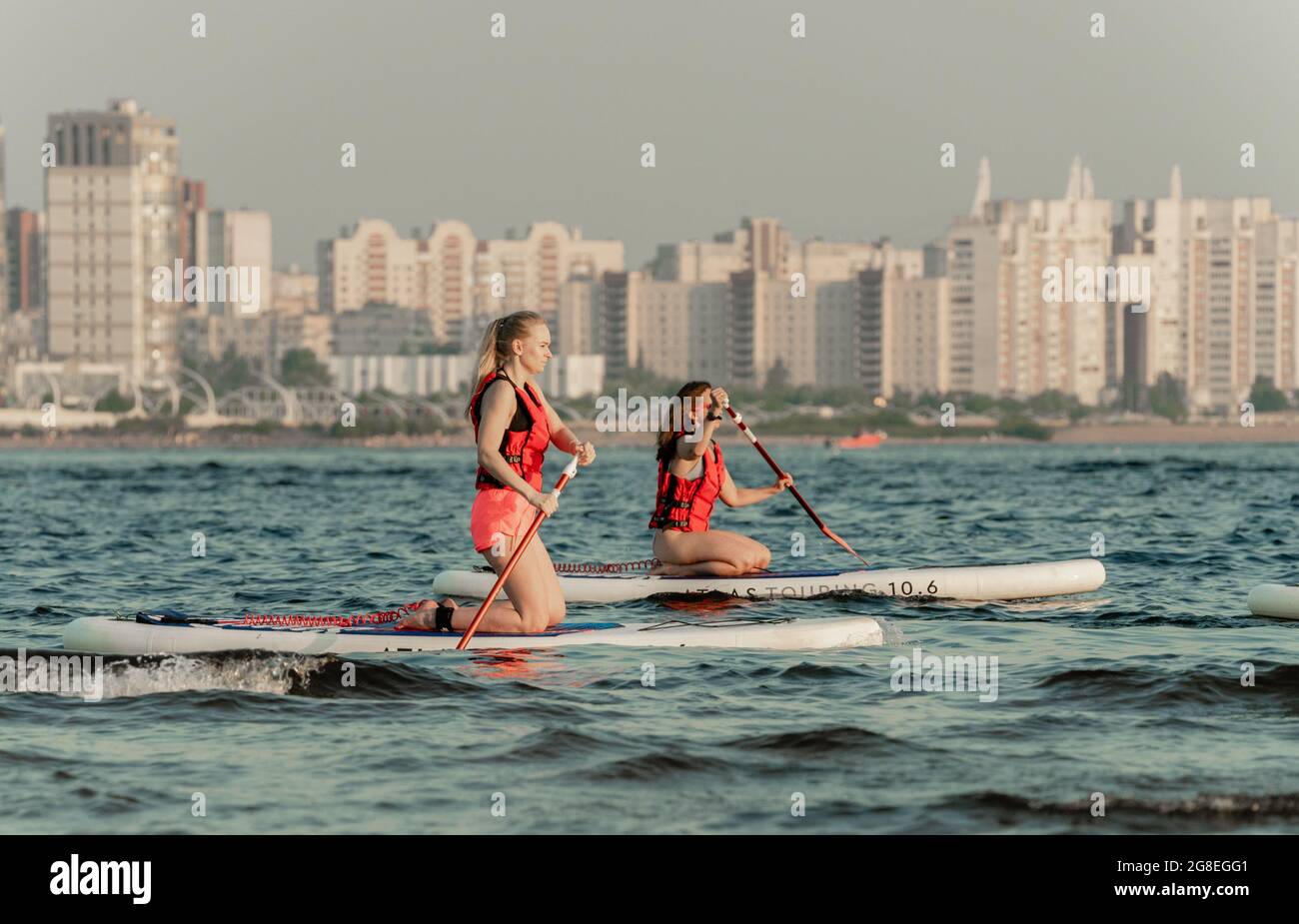 Two women paddling not men hi-res stock photography and images - Alamy