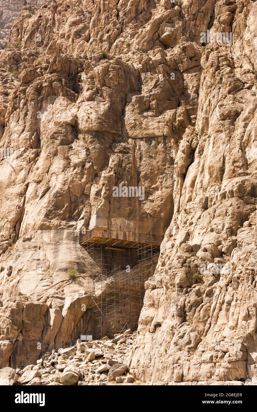 Bisotun(Behistun,Bistun), relief carvings on the face of steep rock ...