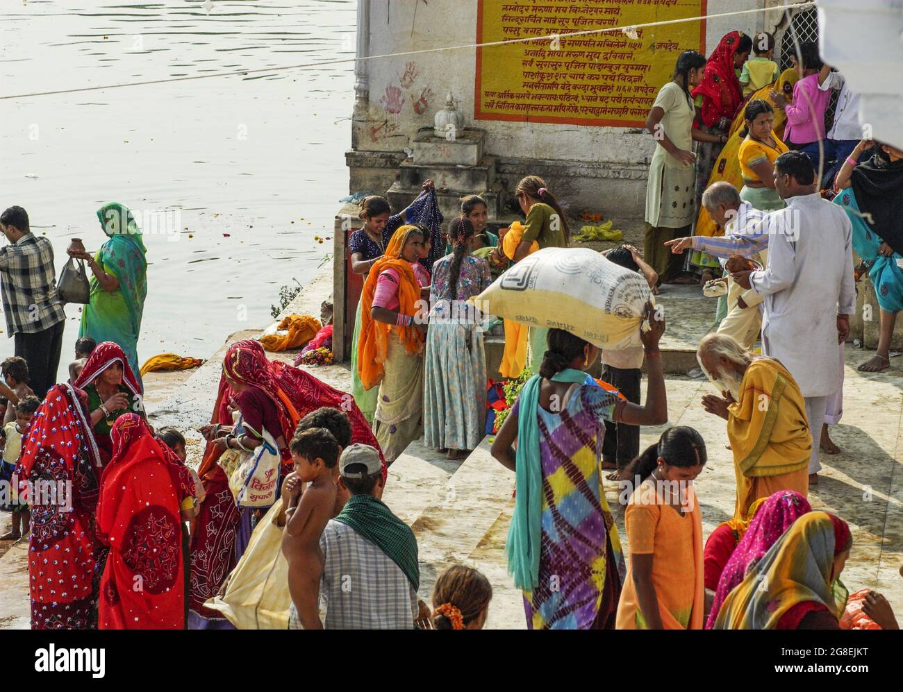 Hindu pilgrims preparing to bath in the tank or sacred lake at Pushkar ...
