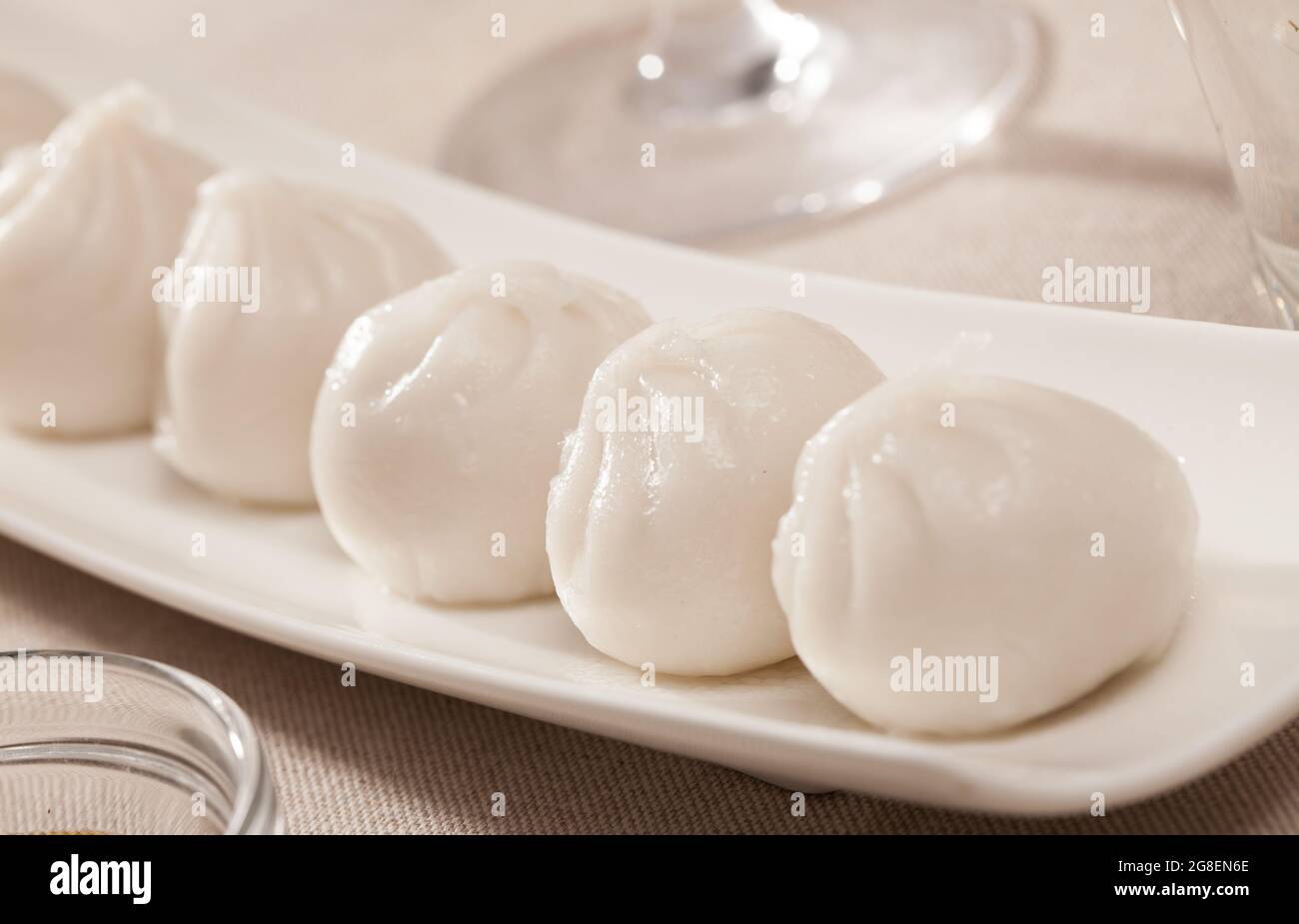 Steamed dim sum served on platter Stock Photo - Alamy