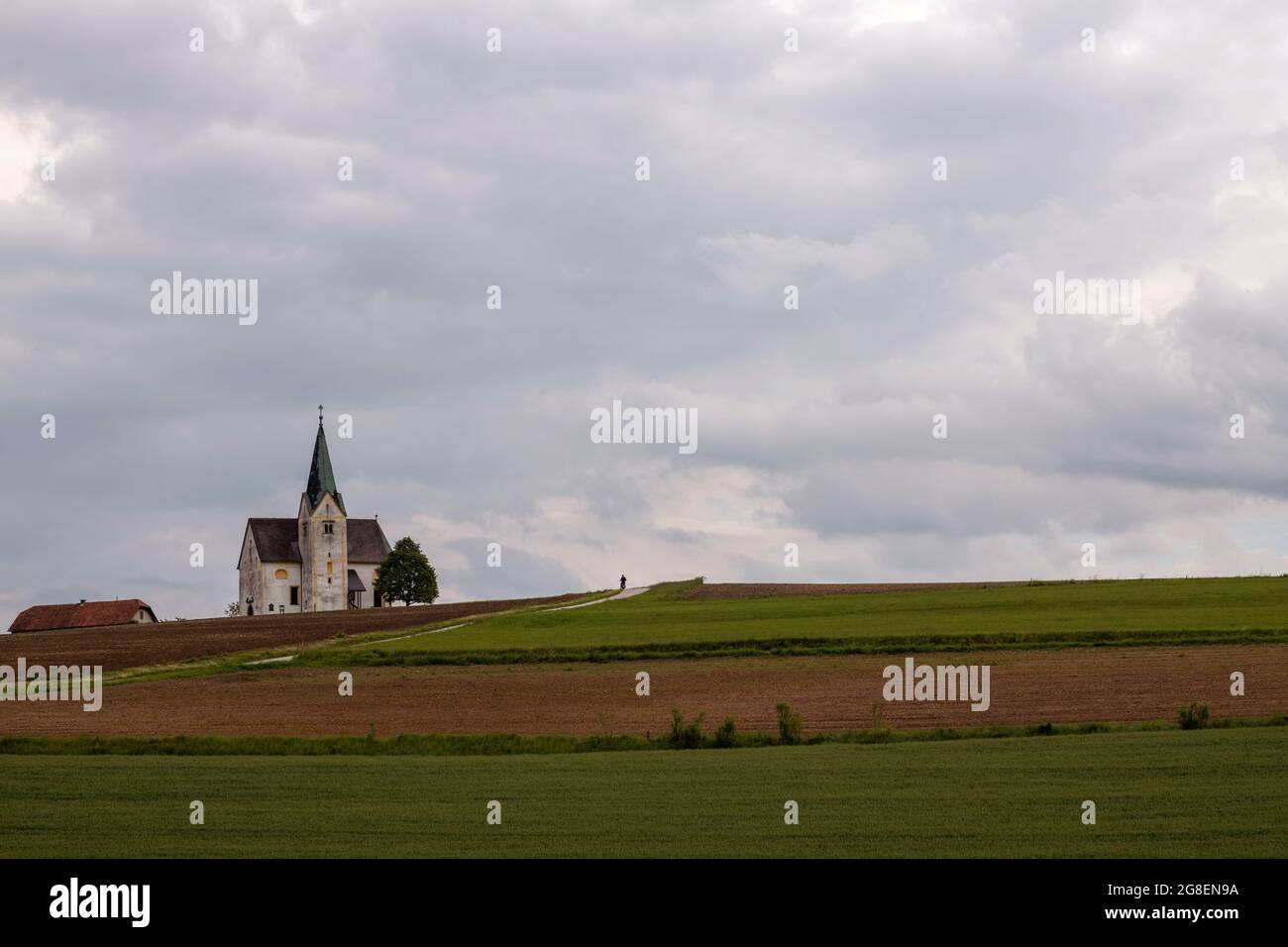 Closeup view of a medieval castle on the far back of a field Stock ...