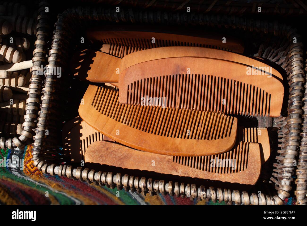 Pile of wooden combs in a box Stock Photo - Alamy