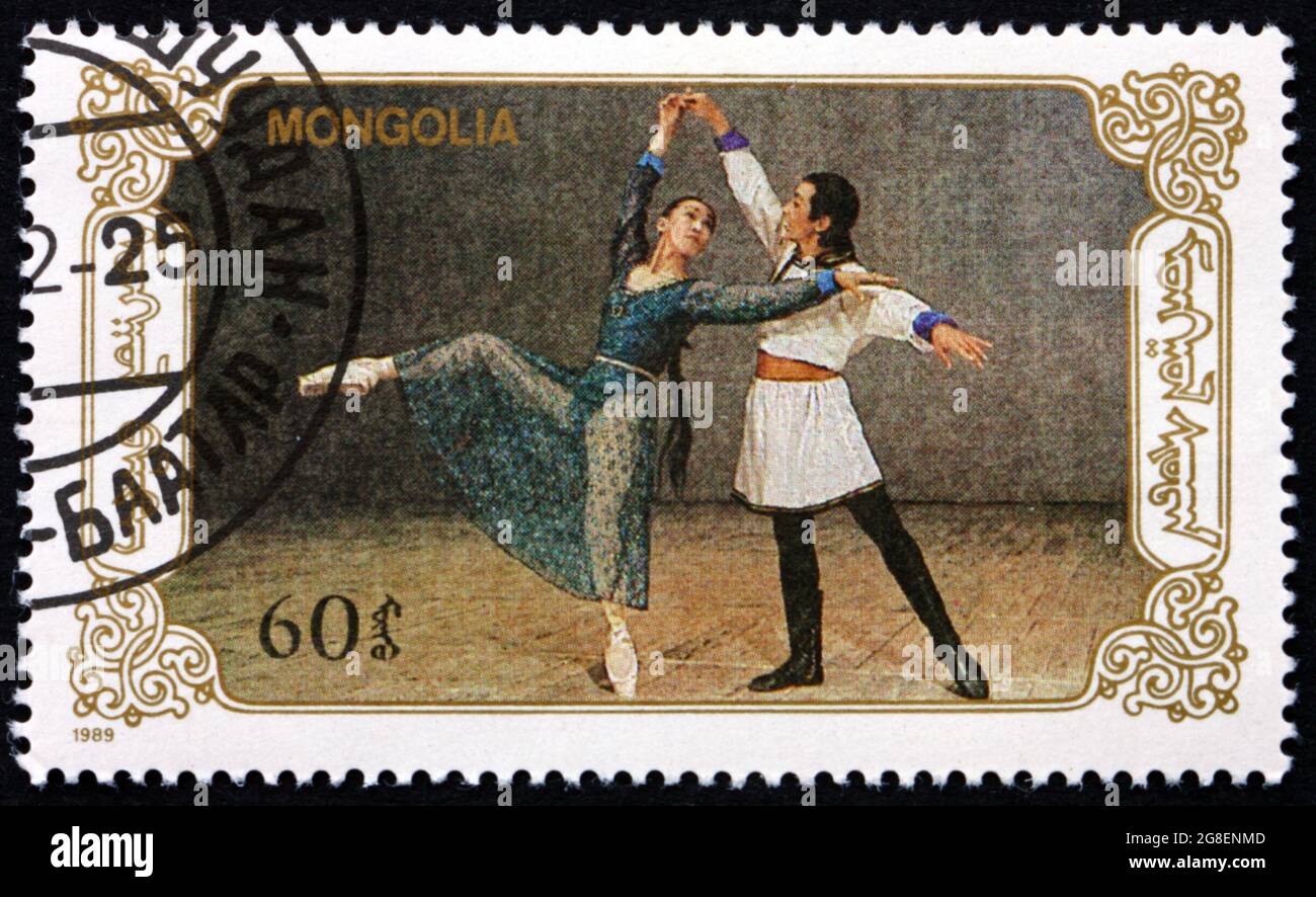 MONGOLIA - CIRCA 1990: a stamp printed in Mongolia shows Dancers in ...