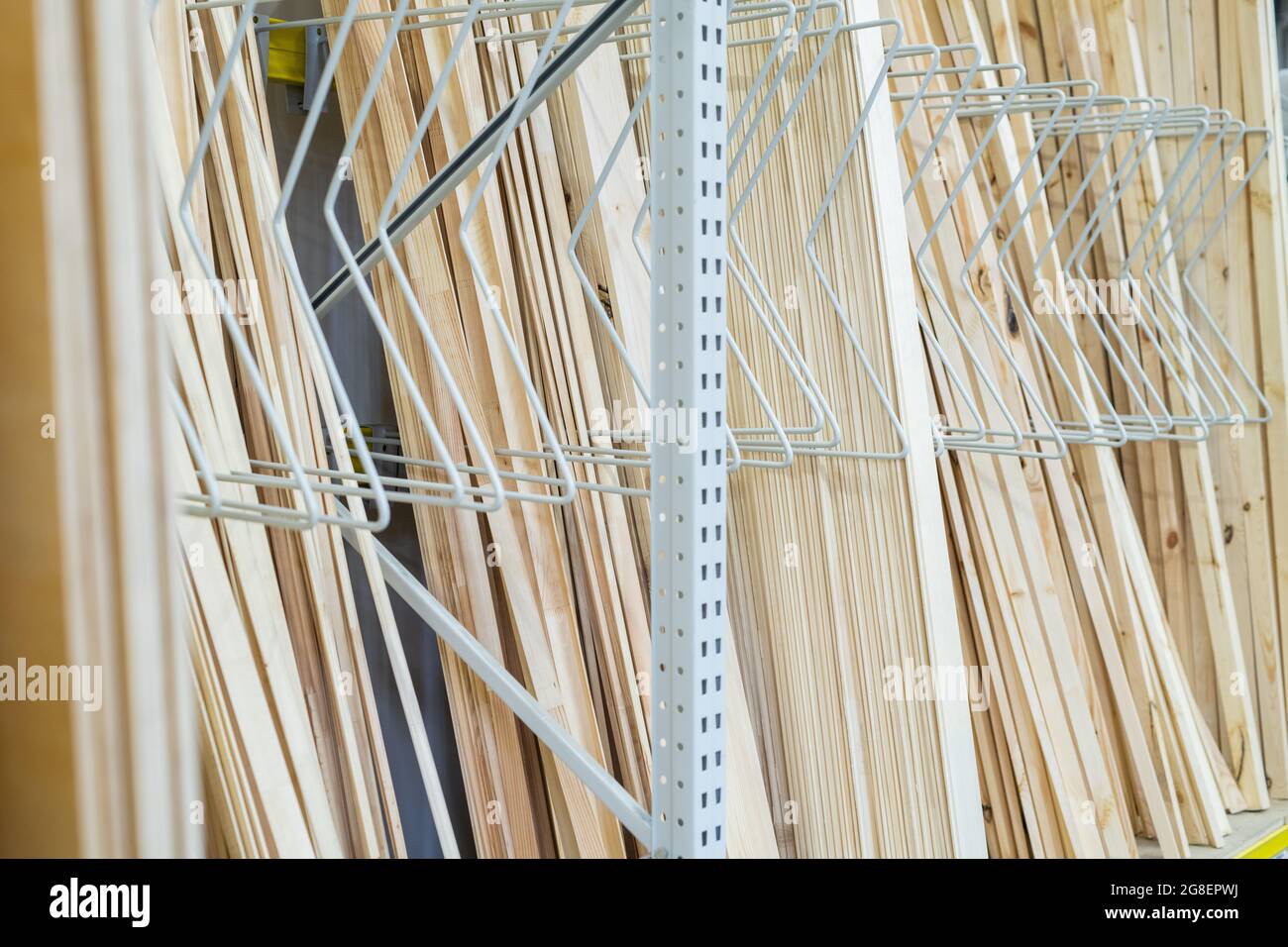 Part of large display with long wooden planks in hardware store Stock ...