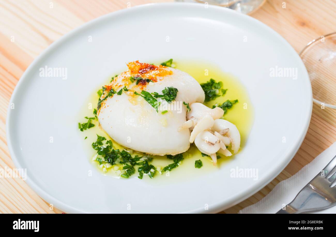 Dish of Mediterranean cuisine - roasted cuttlefish Stock Photo - Alamy