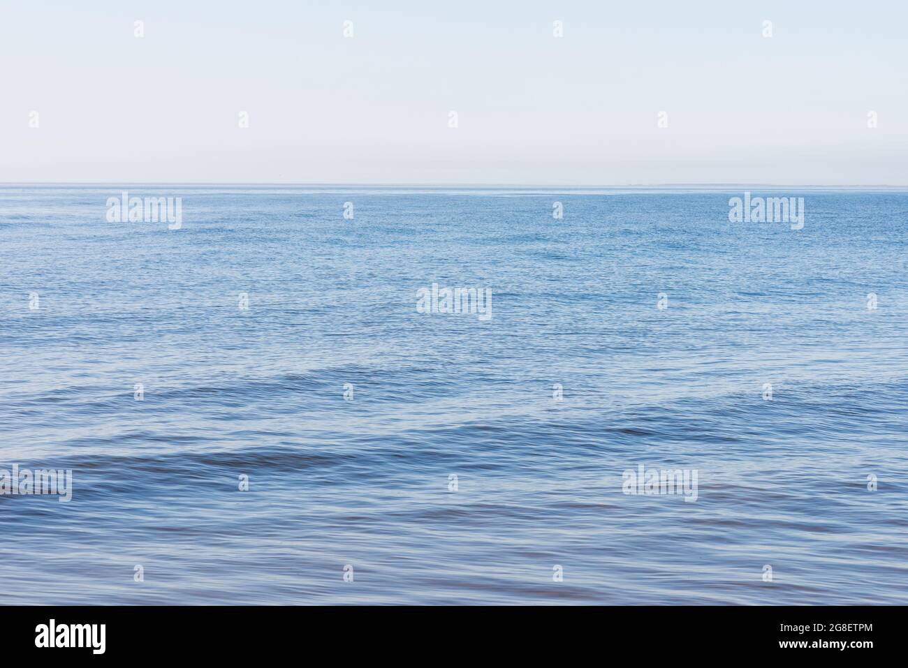 Areal shot of deep blue and rough sea with lot of sea spray.Blue ...
