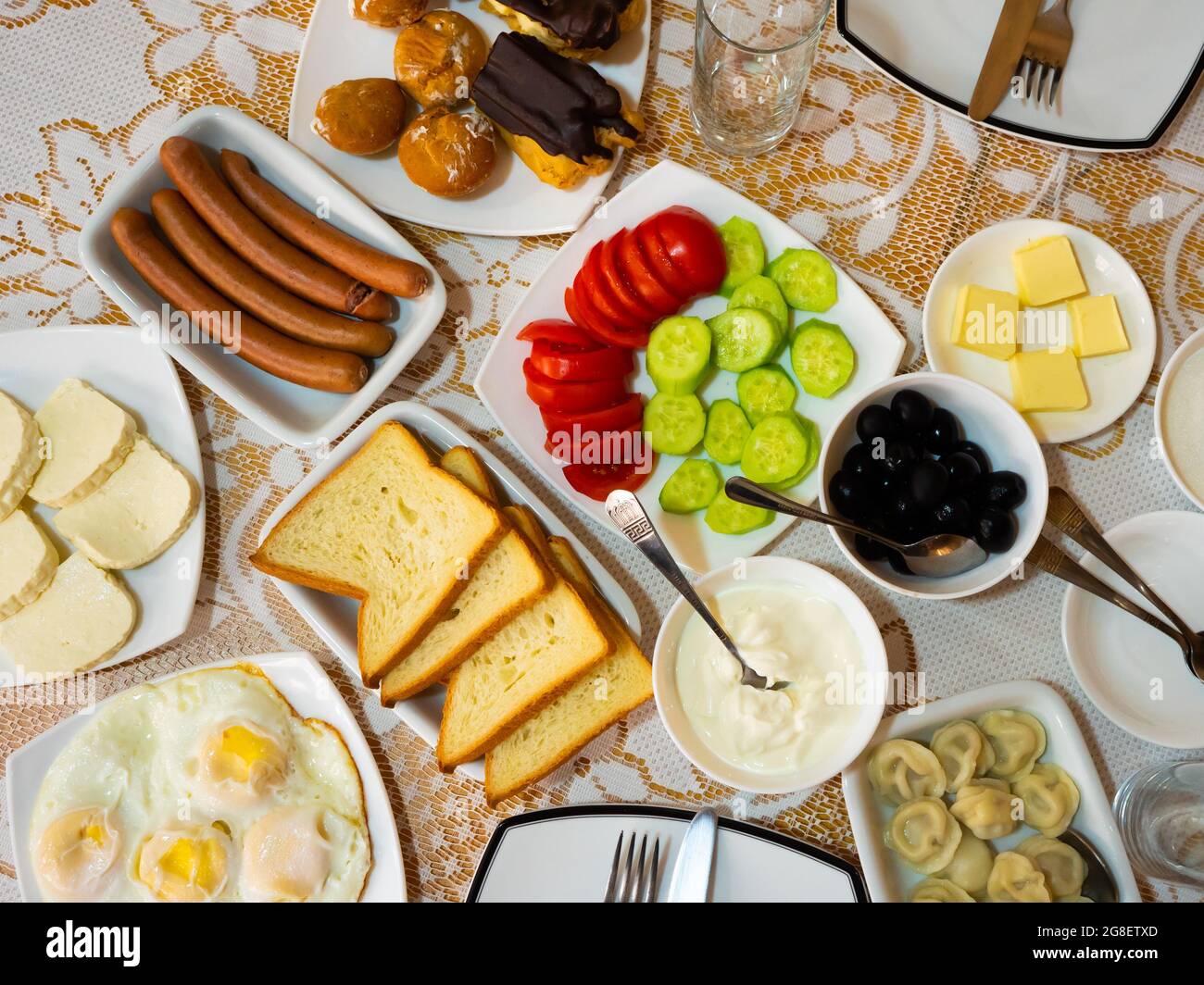 Breakfast in georgian hotel with fried eggs, cheese, vegetables Stock ...