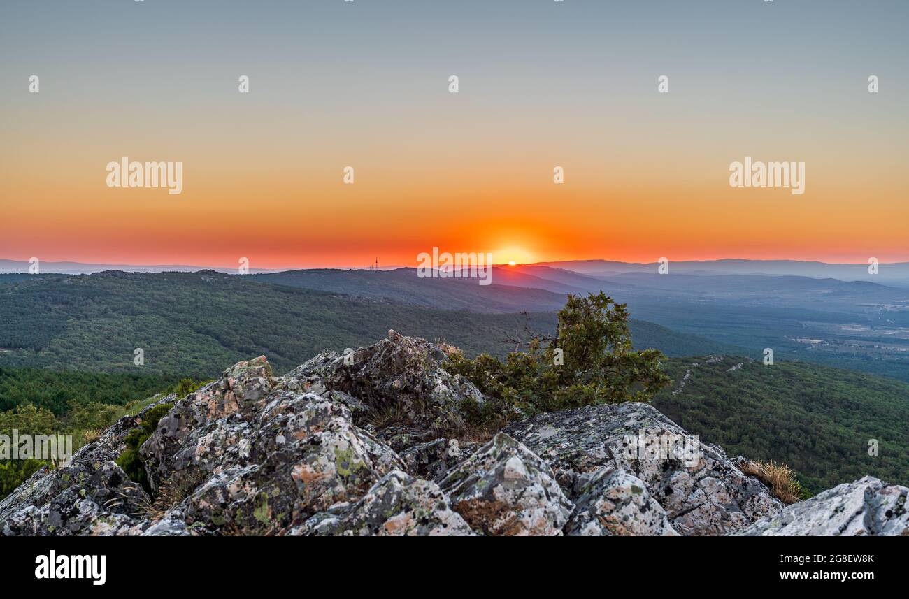 Half sun over the horizon with communication antennas Stock Photo - Alamy