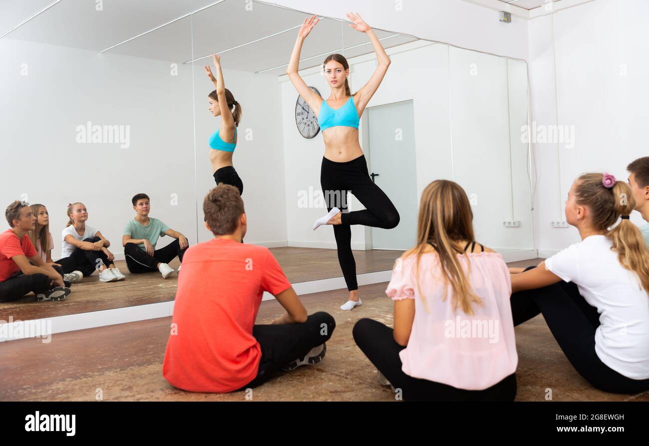 Female dance teacher giving dance class for teens Stock Photo - Alamy