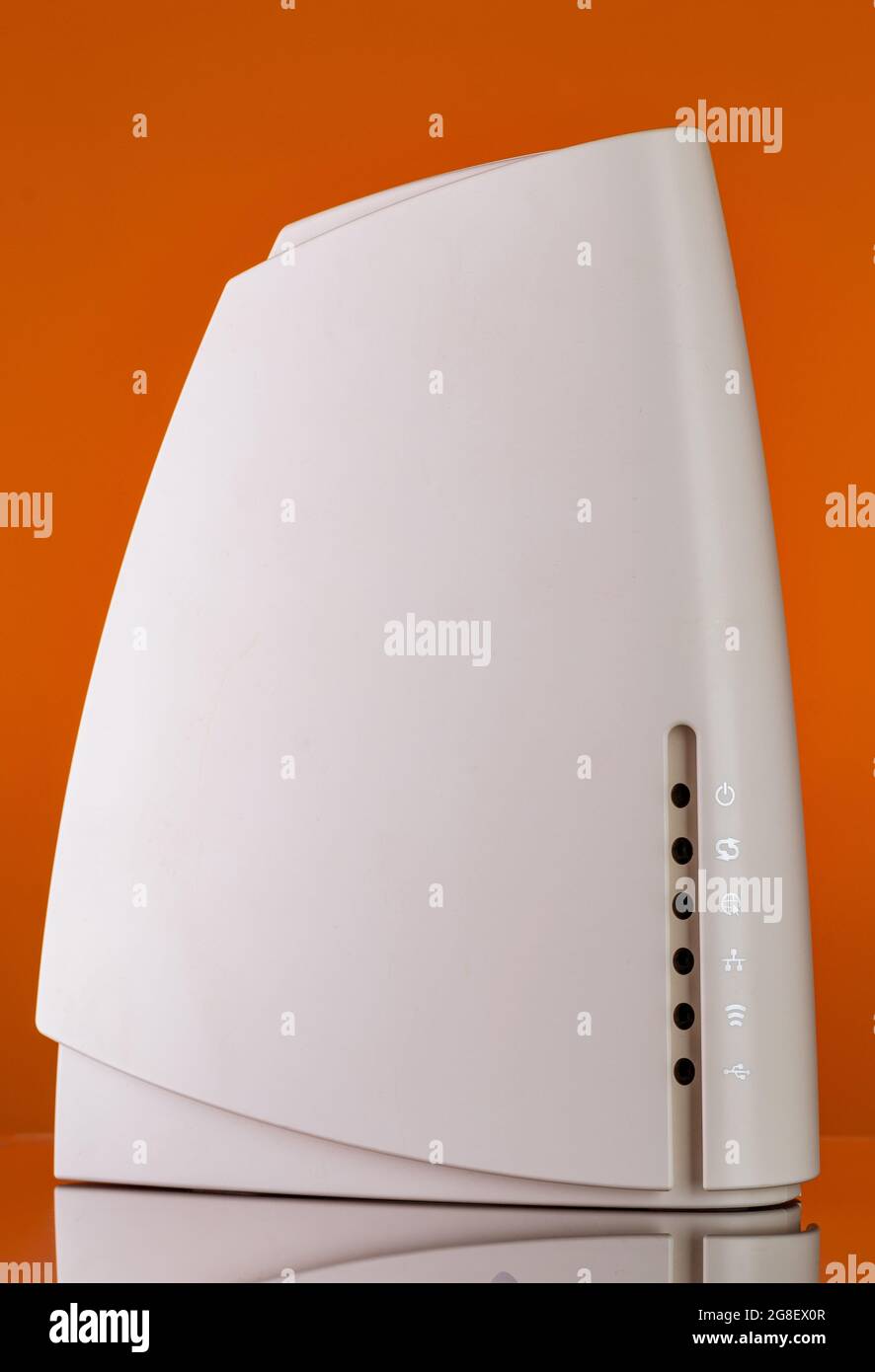 Vertical shot of a Wi-Fi modem on an orange background Stock Photo - Alamy