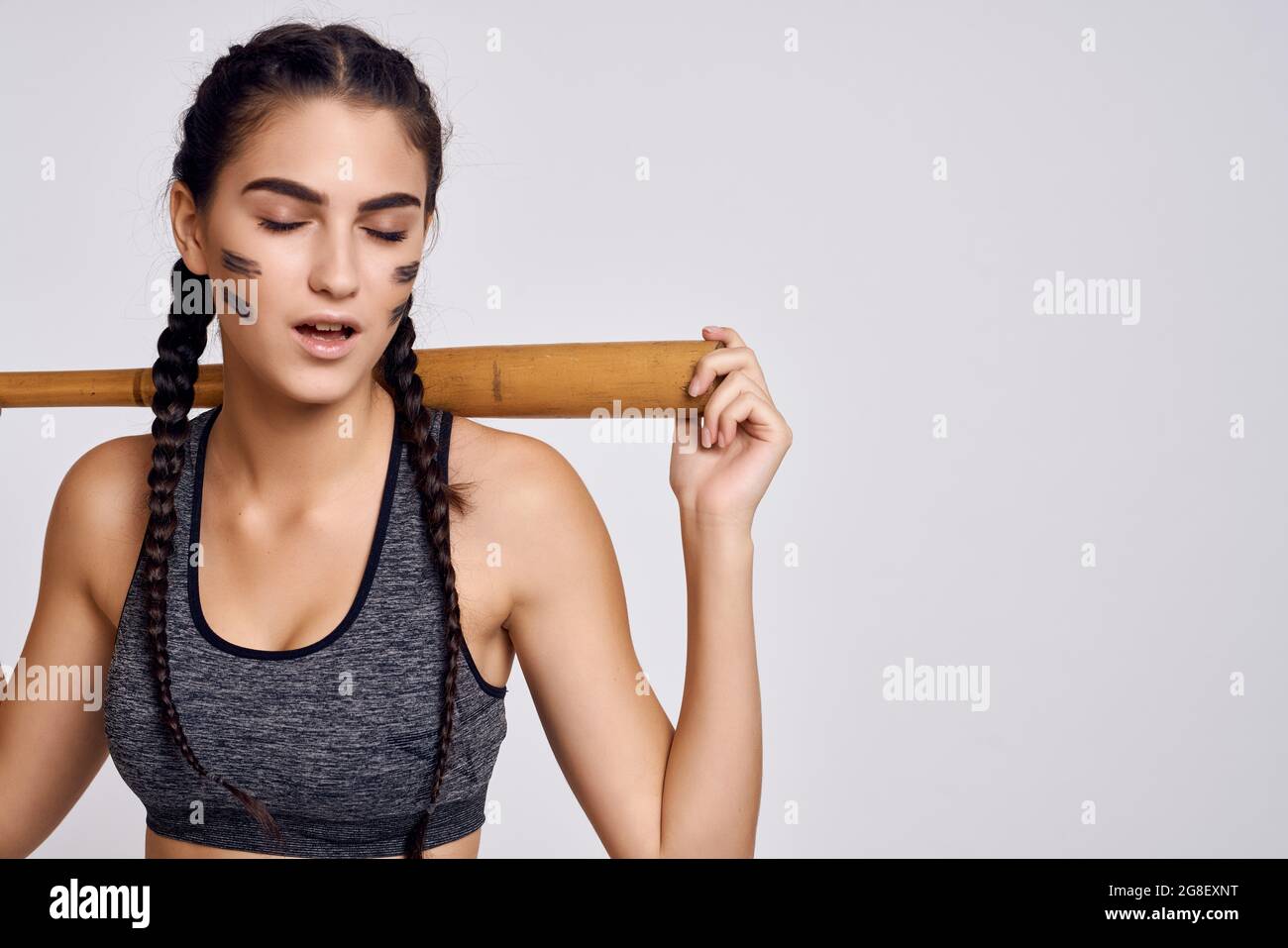 sportive woman with baseball bat workout exercise studio Stock Photo ...