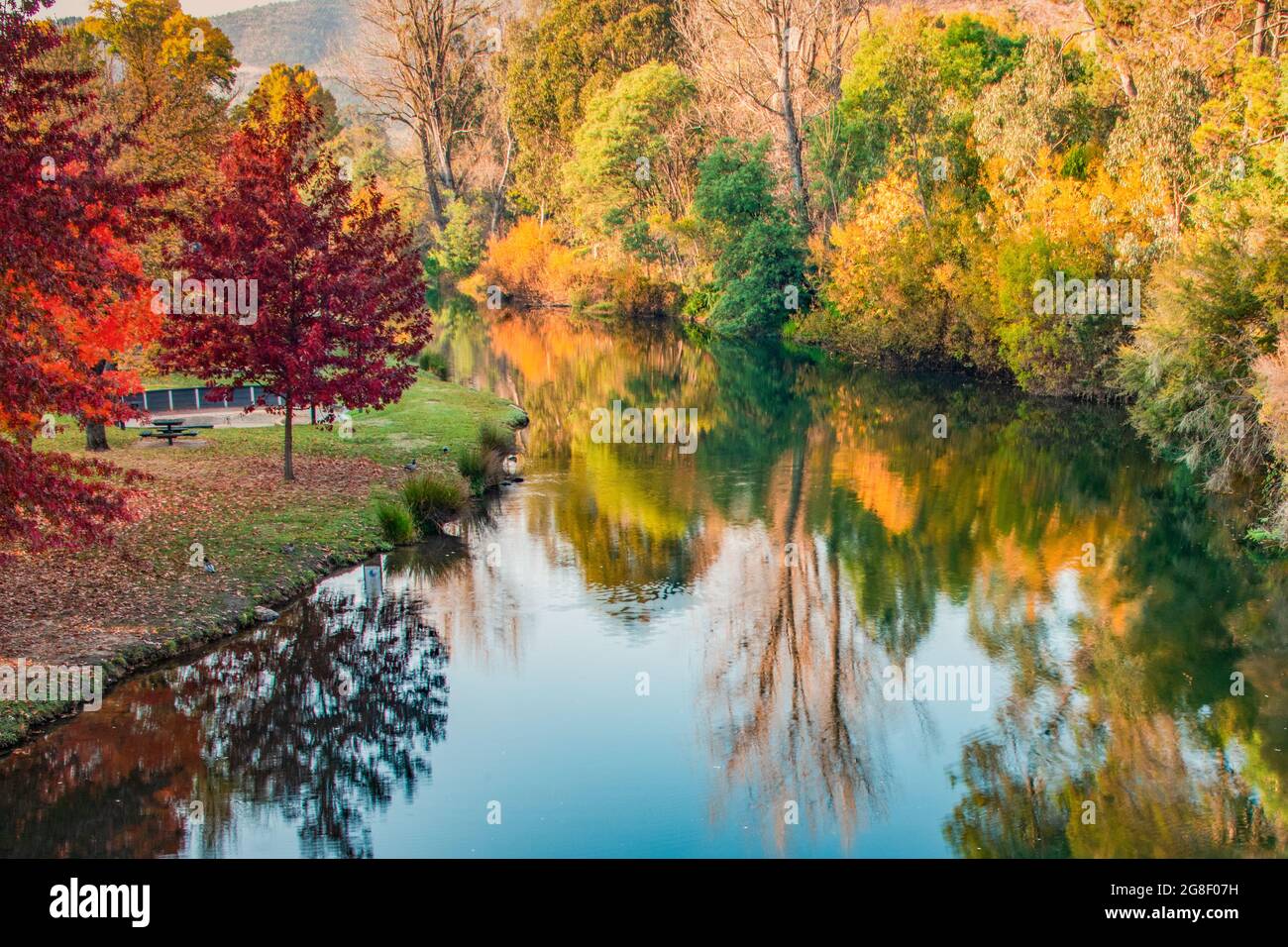Looking down on a river surrounded by the colours of autumn Stock Photo ...