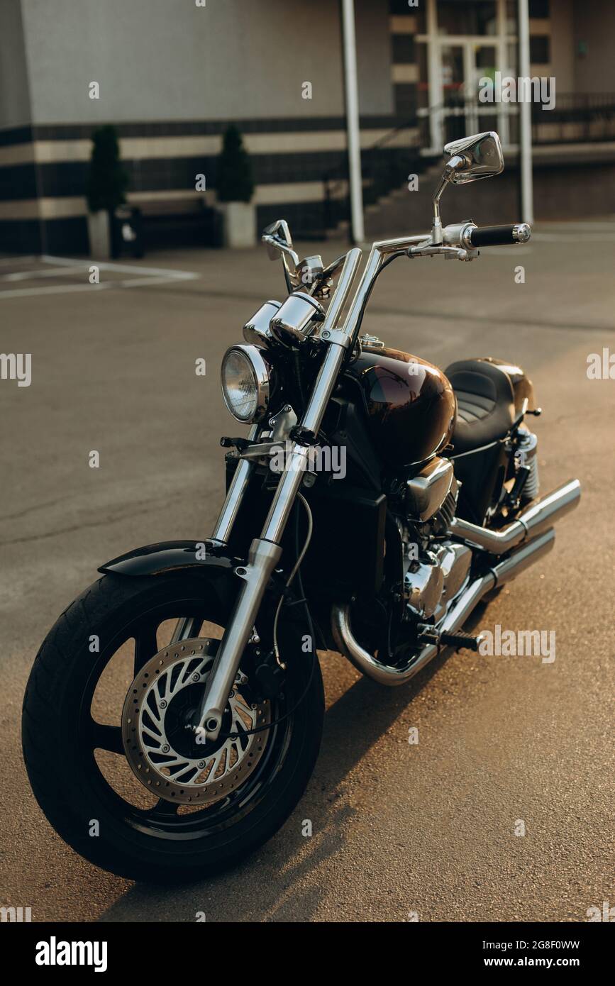 Freedom. Motorcycle in the parking lot. Stylish custom chopper motobike ...