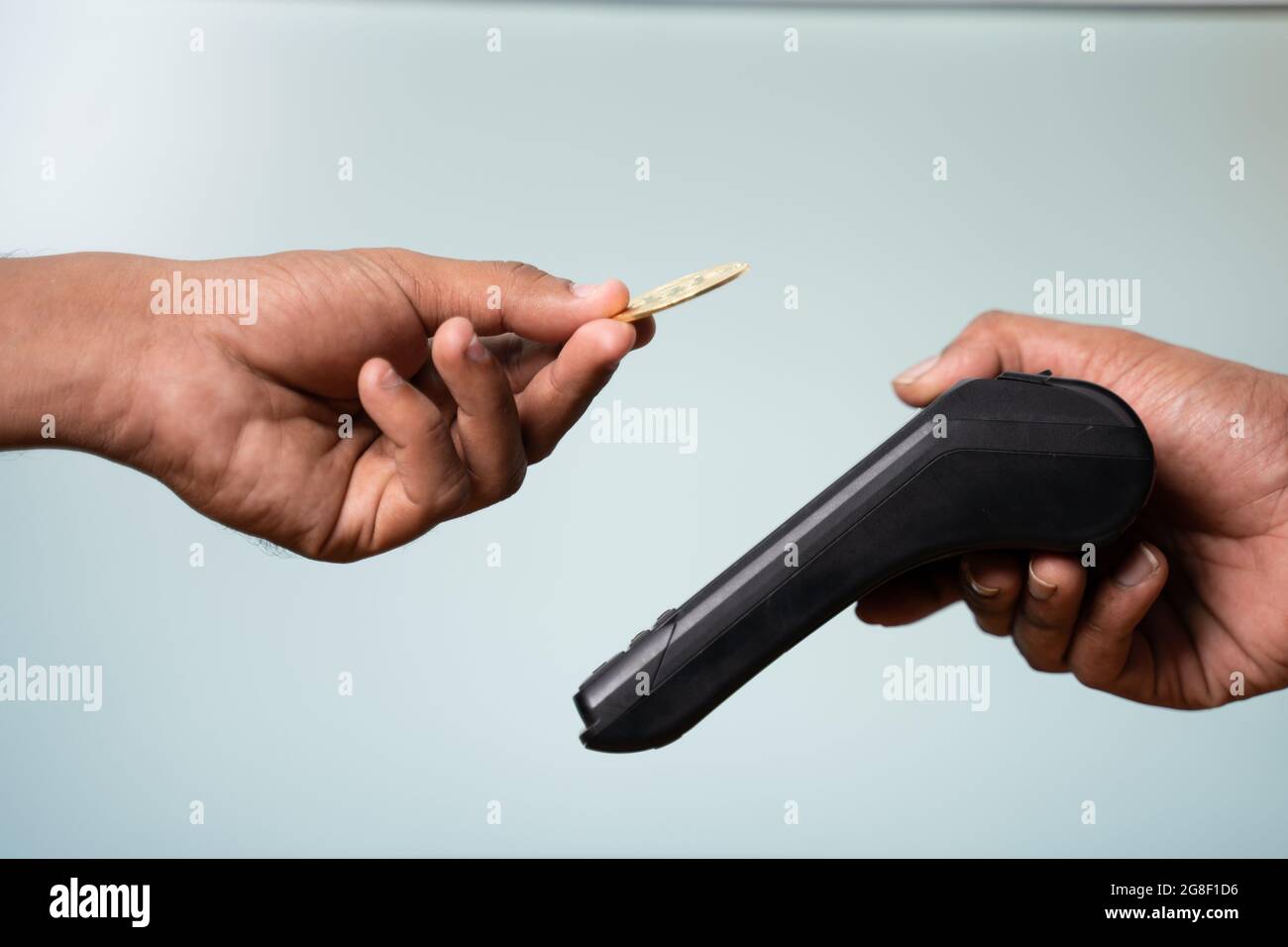 Concept showing of cryptocurrency payment - Hands paying buy placing on ...