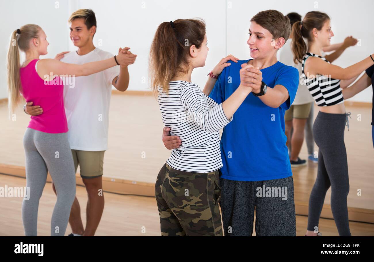 boys and girls dancing tango Stock Photo - Alamy