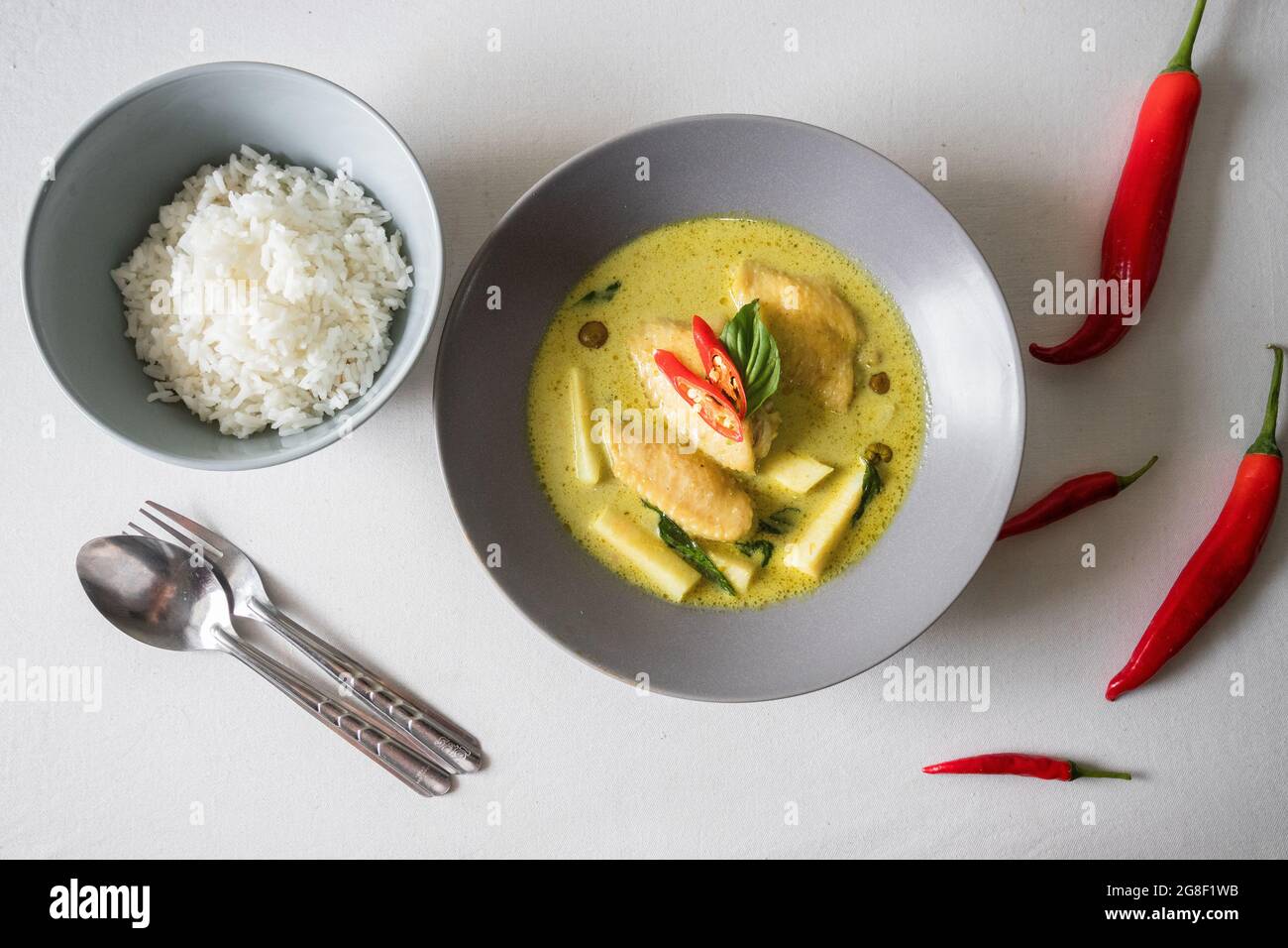 Chicken green curry with rice Stock Photo - Alamy