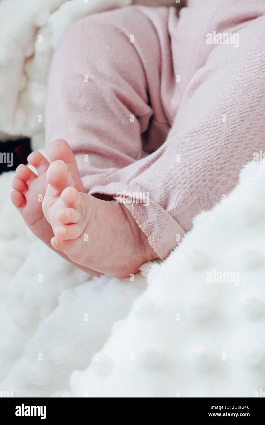 Vertical shot of feet of a kid Stock Photo - Alamy
