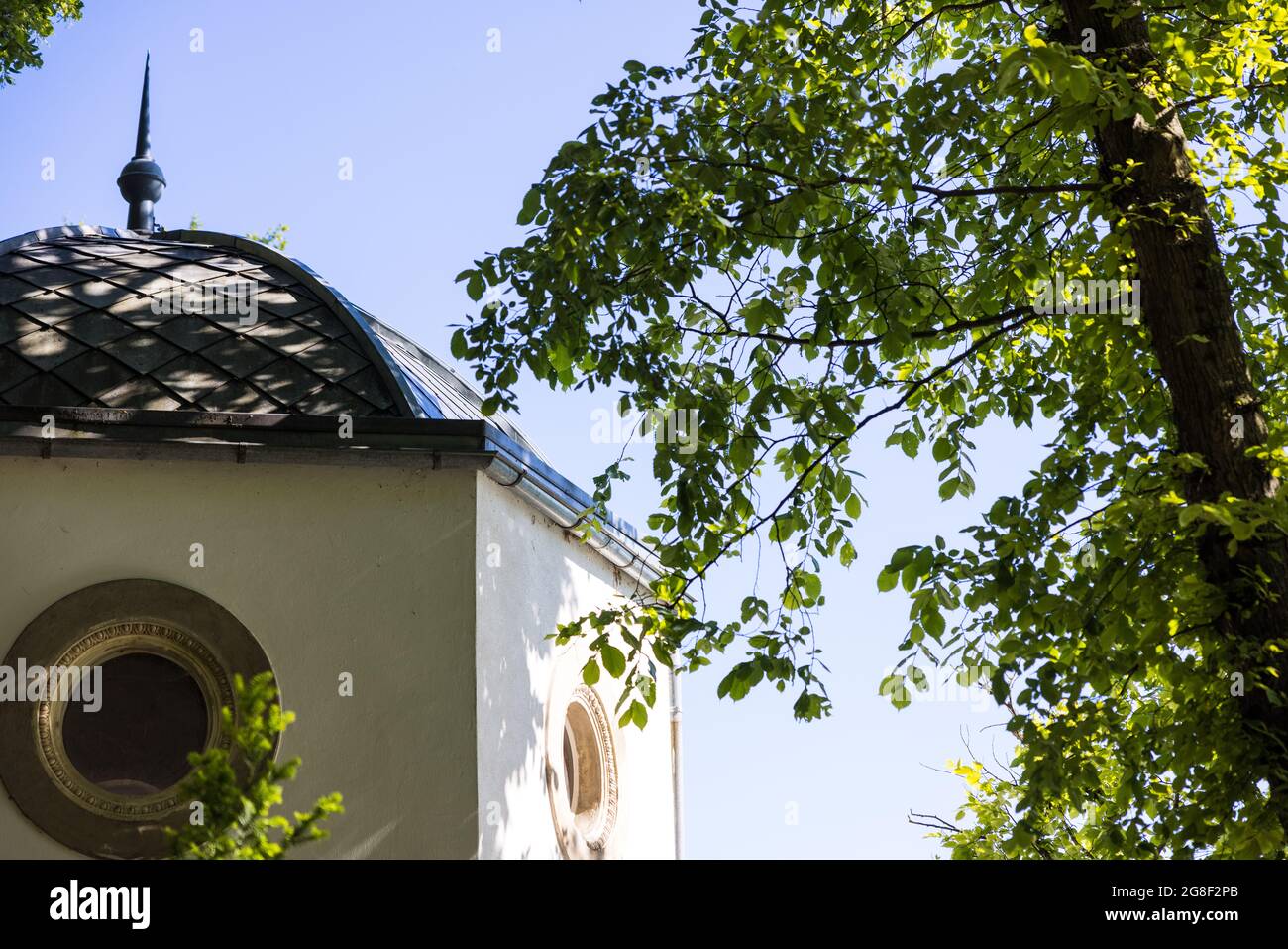 Closeup a building apex on a sky background Stock Photo - Alamy