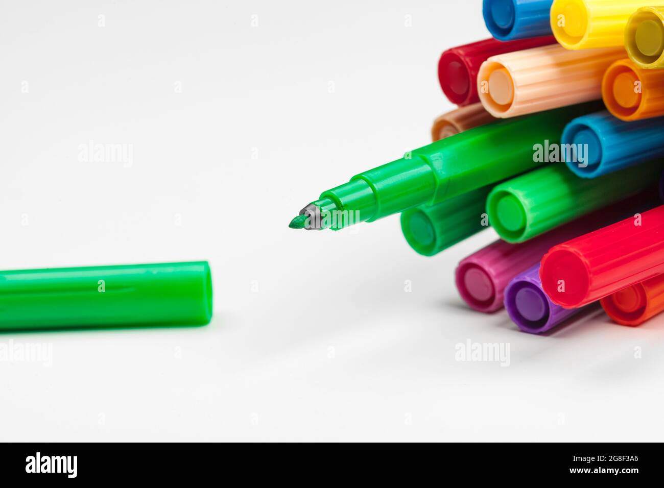 Colored markers isolated on white background Stock Photo - Alamy