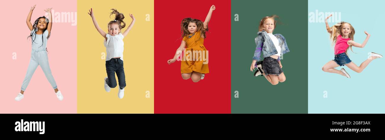 Art collage made of little and happy kids jumping isolated on ...