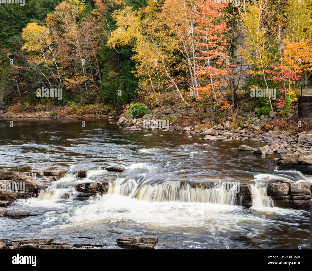 Waterfalls and autumn trees at Canyon Sainte-Anne Gorge, Quebec, Canada ...