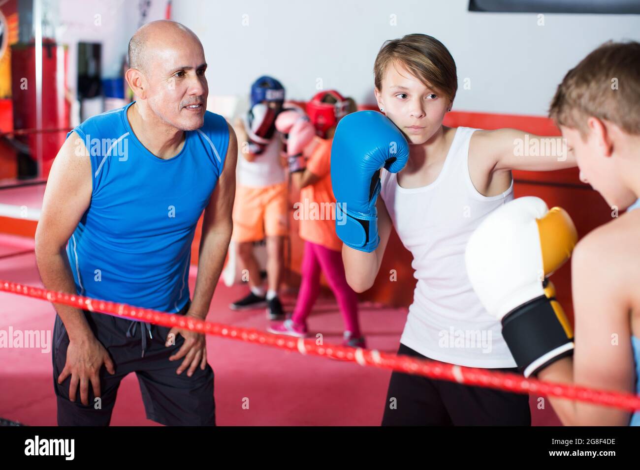 Children training on boxing ring Stock Photo - Alamy