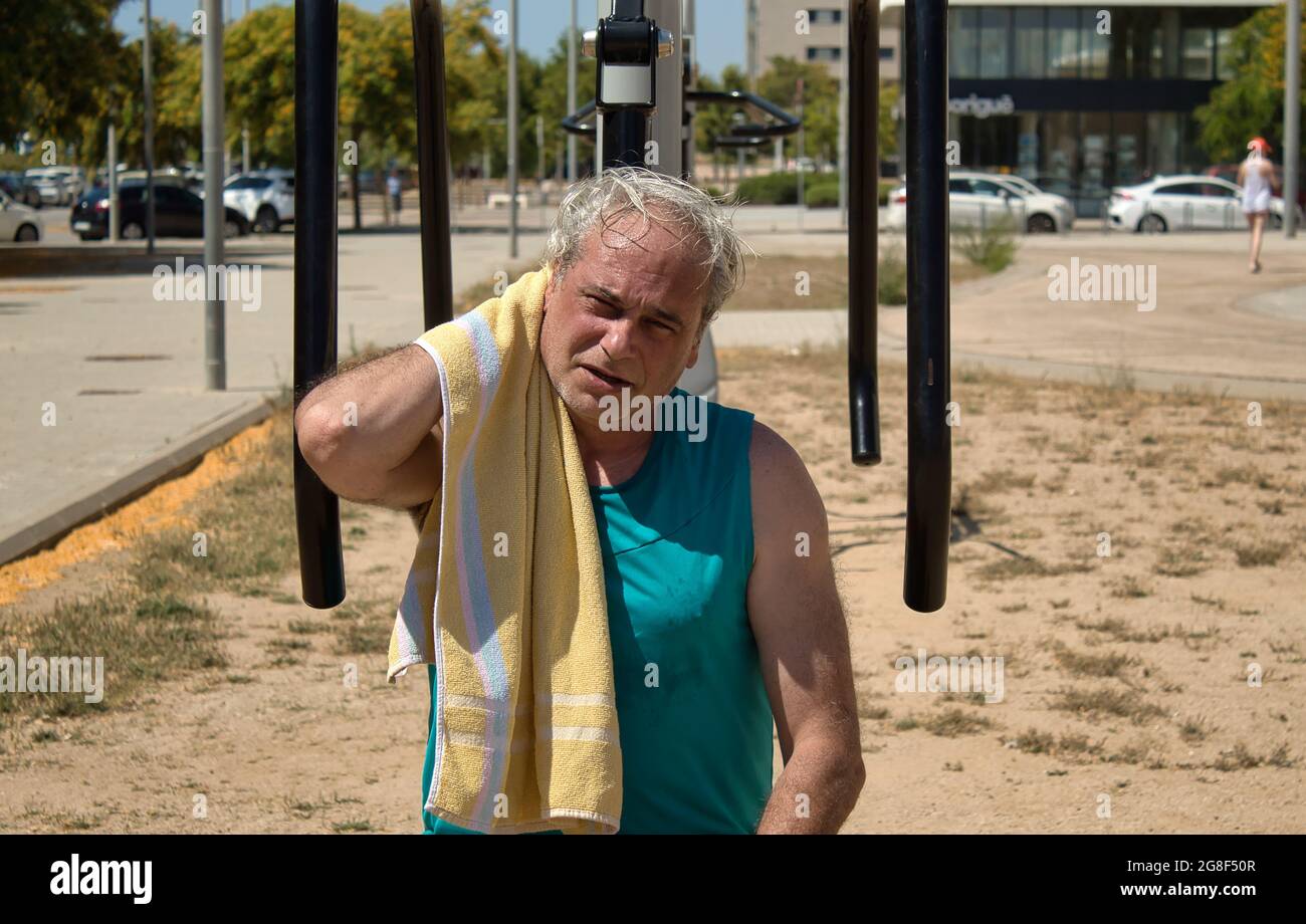 Man wiping sweat High Resolution Stock Photography and Images - Alamy