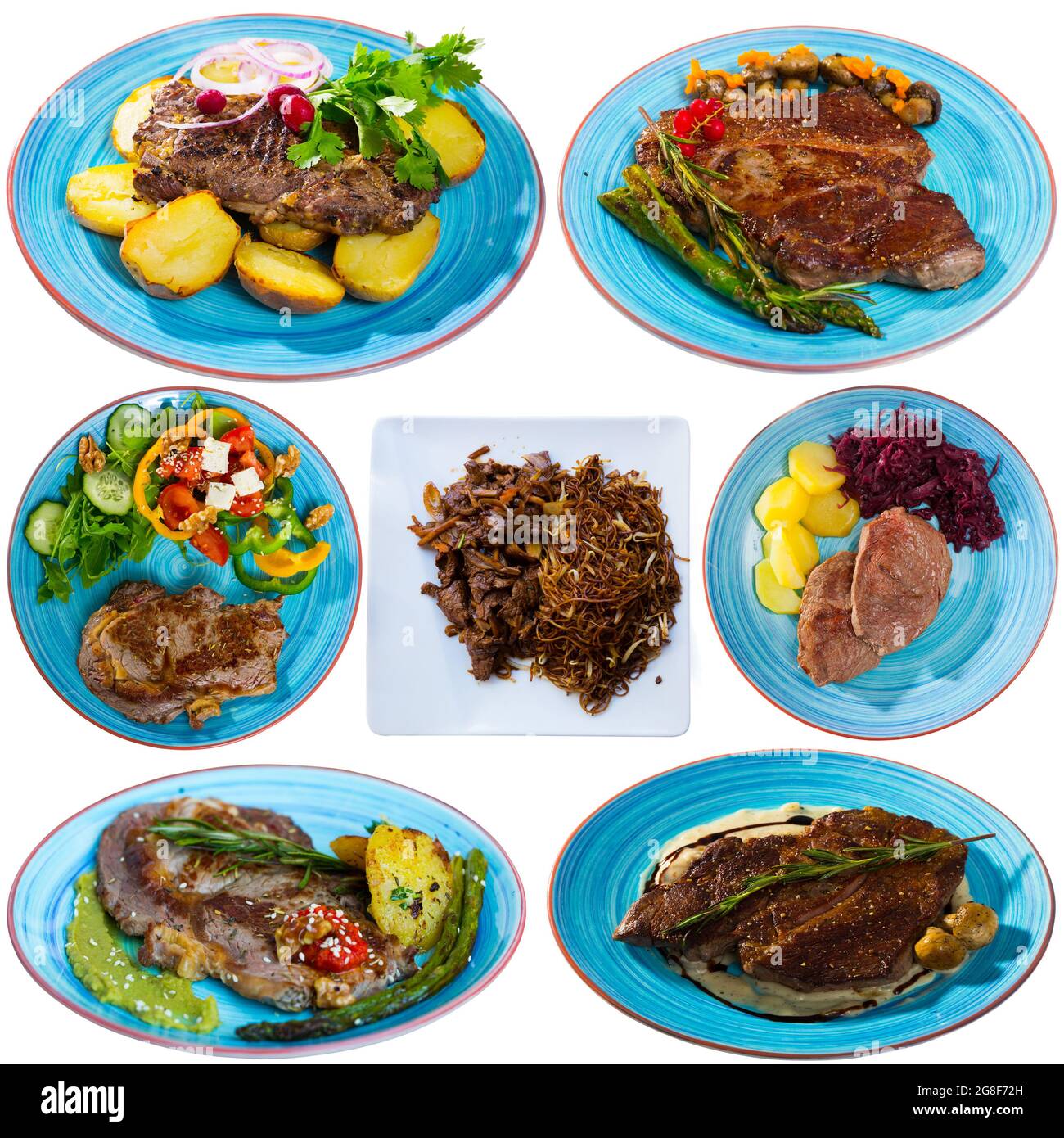 Assorted beef dishes on a white background Stock Photo - Alamy