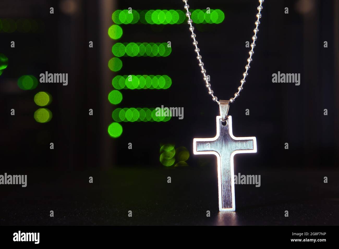 Christian cross on the background of computer technology in the server ...