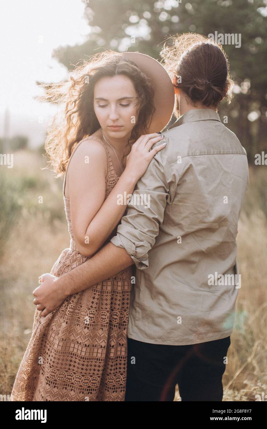 Boyfriend and Girlfriend hug each other in nature Stock Photo - Alamy