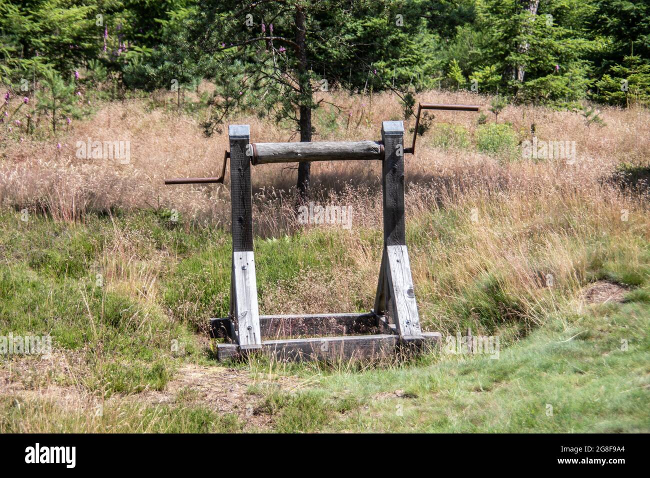Well with cranks in the mining area Stock Photo - Alamy