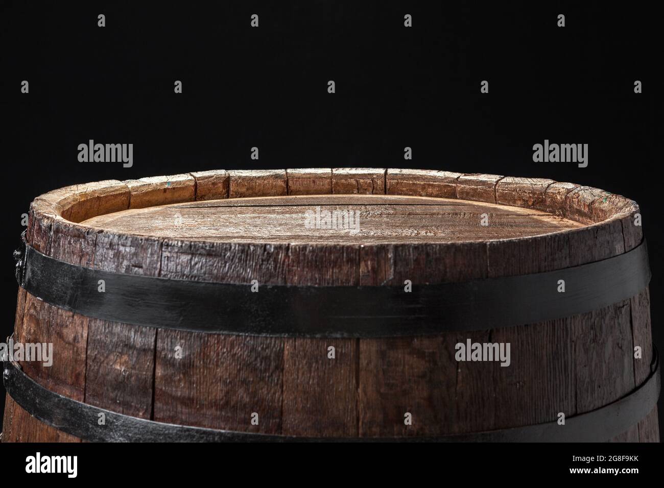 Wooden barrel on a dark background hi-res stock photography and images ...