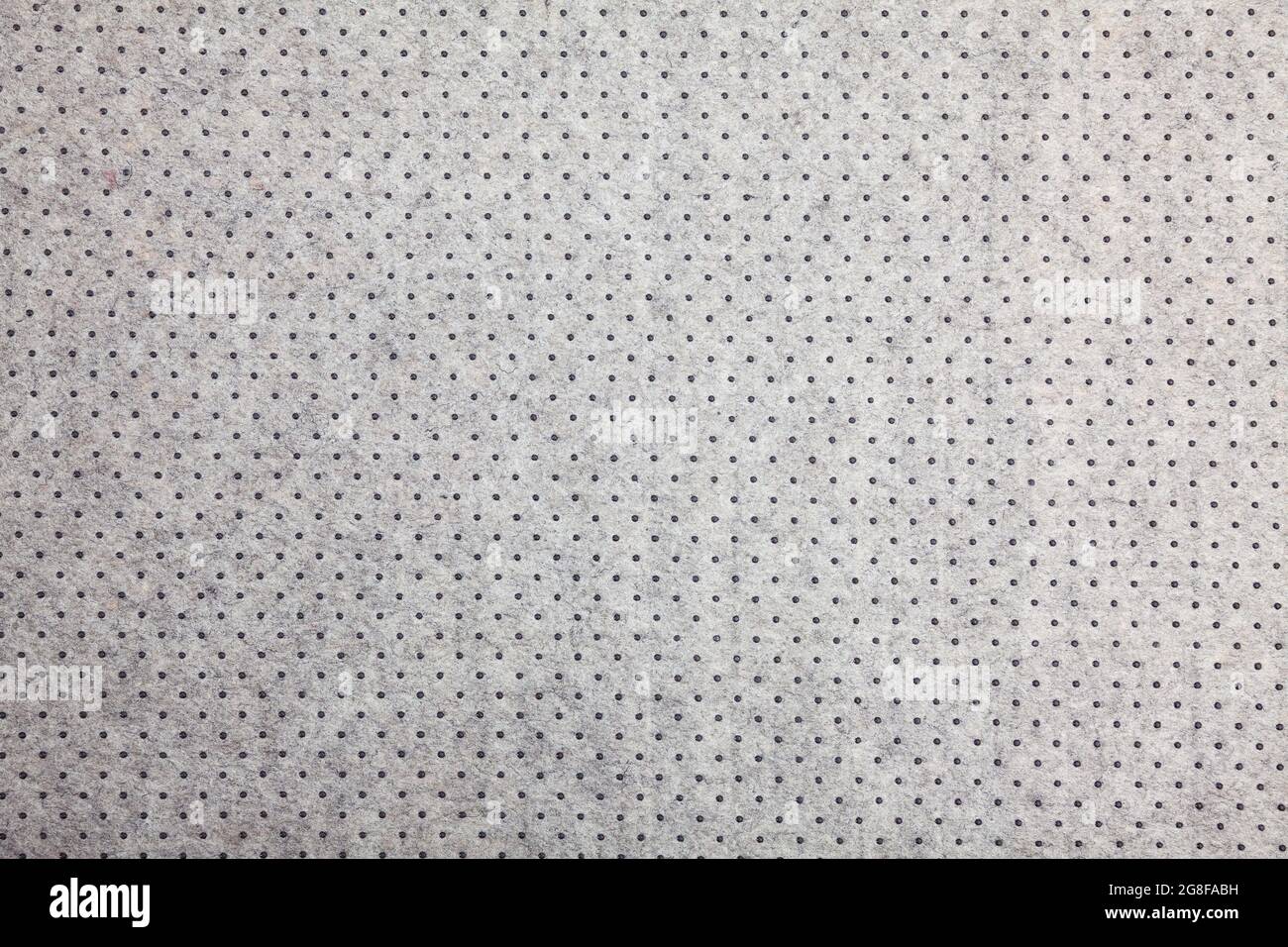 Grey felt material background with dark dots Stock Photo - Alamy