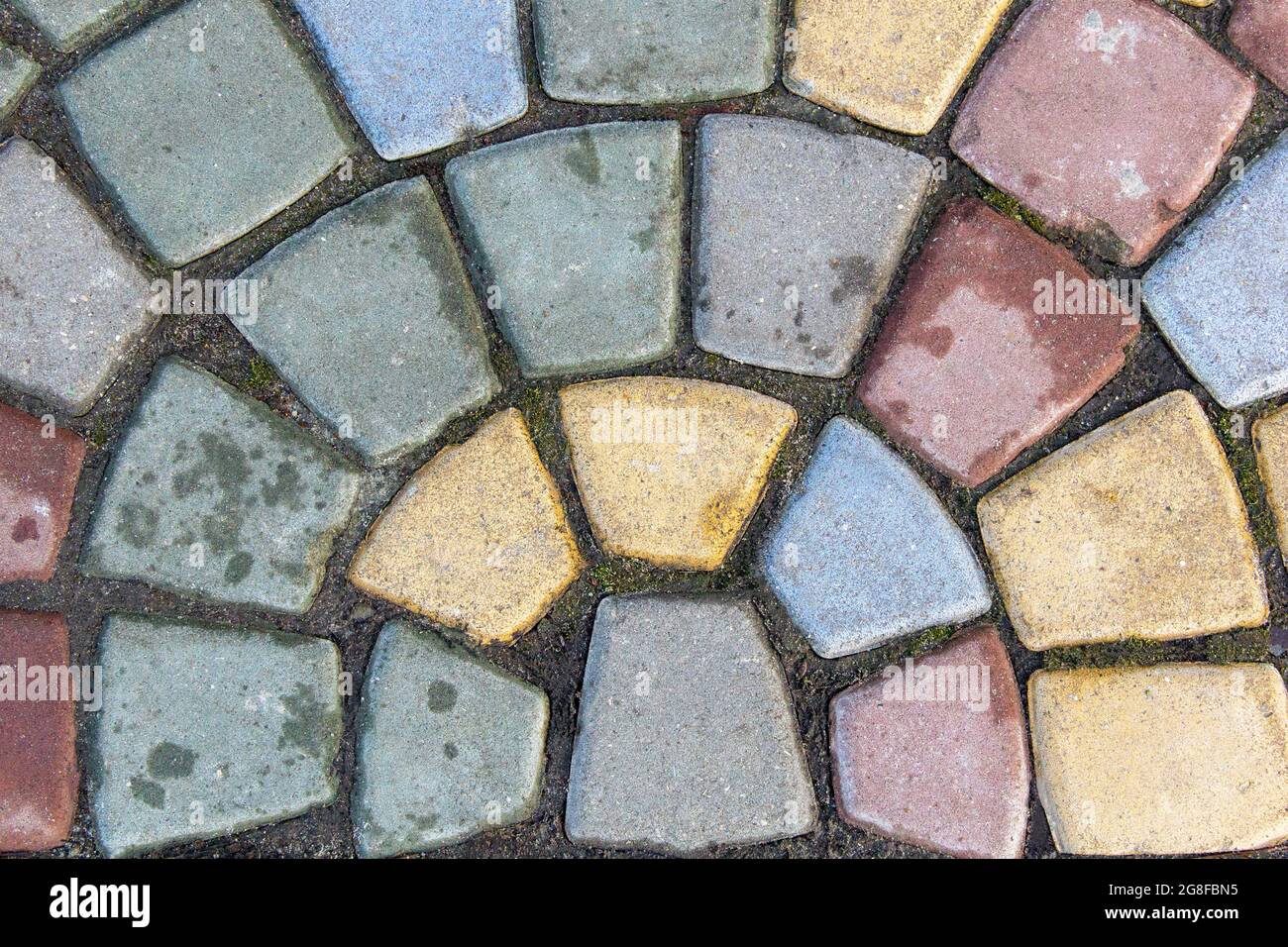 multi-color concrete paving slab. Beautiful pattern, background close ...
