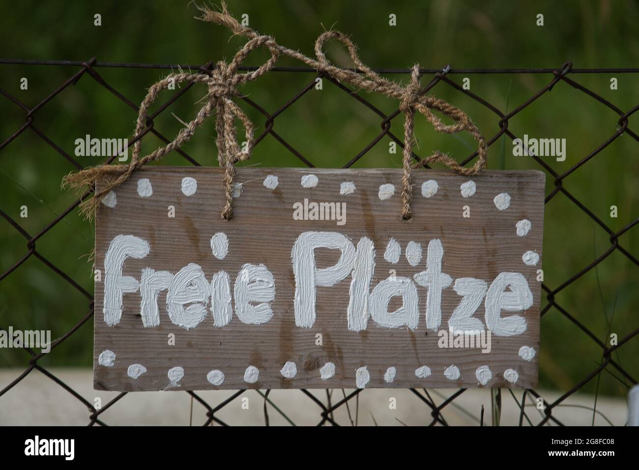 Free space sign hanging on a wired fence Stock Photo - Alamy