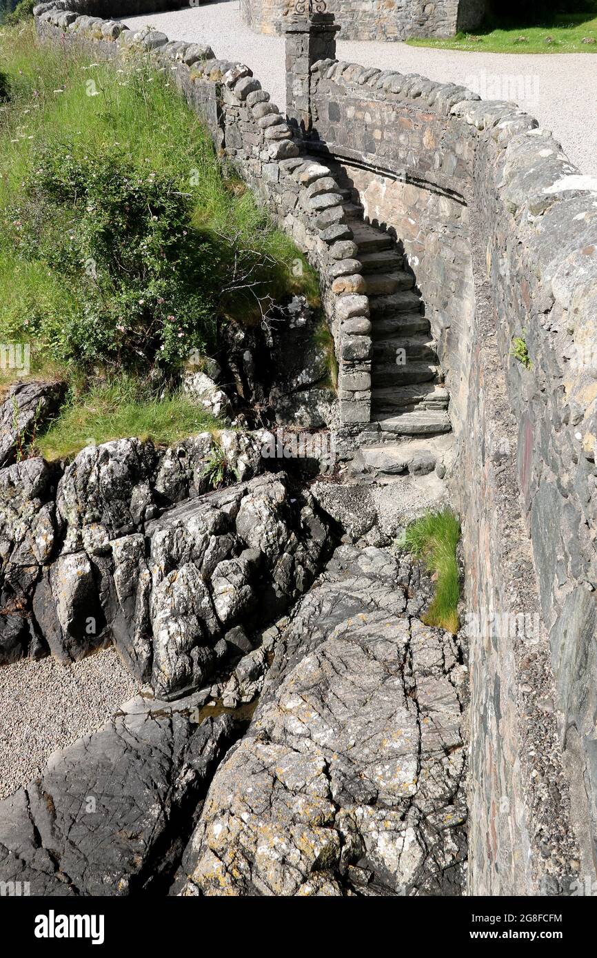 External stone staircase at Eilean Donan castle in scottish highlands ...