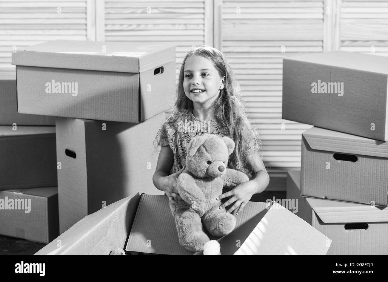 All Within Your Reach. happy little girl with toy. purchase of new ...