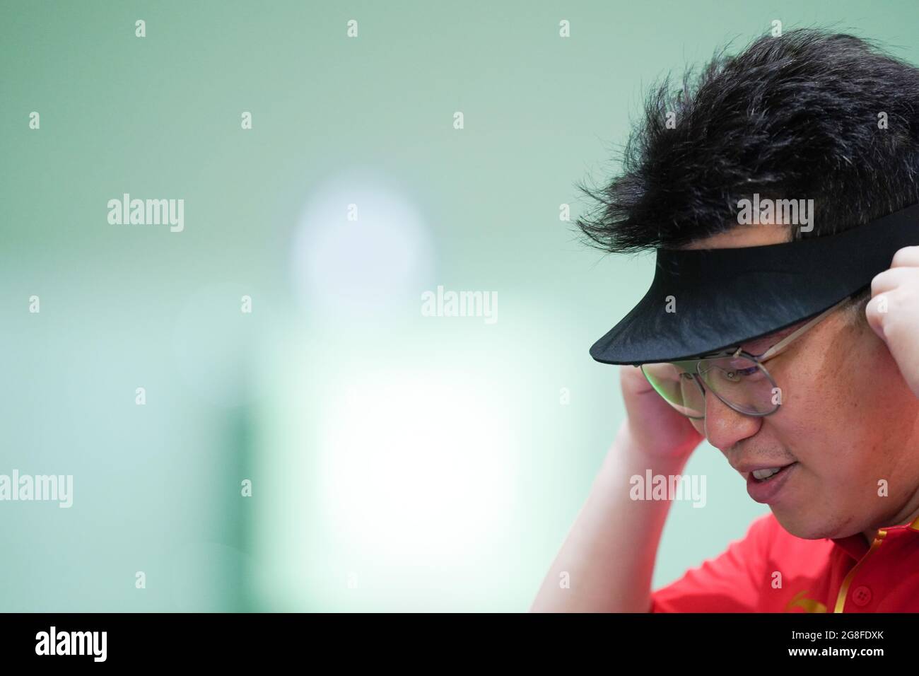 Tokyo, Japan. 20th July, 2021. Chinese shooter Pang Wei attends a ...