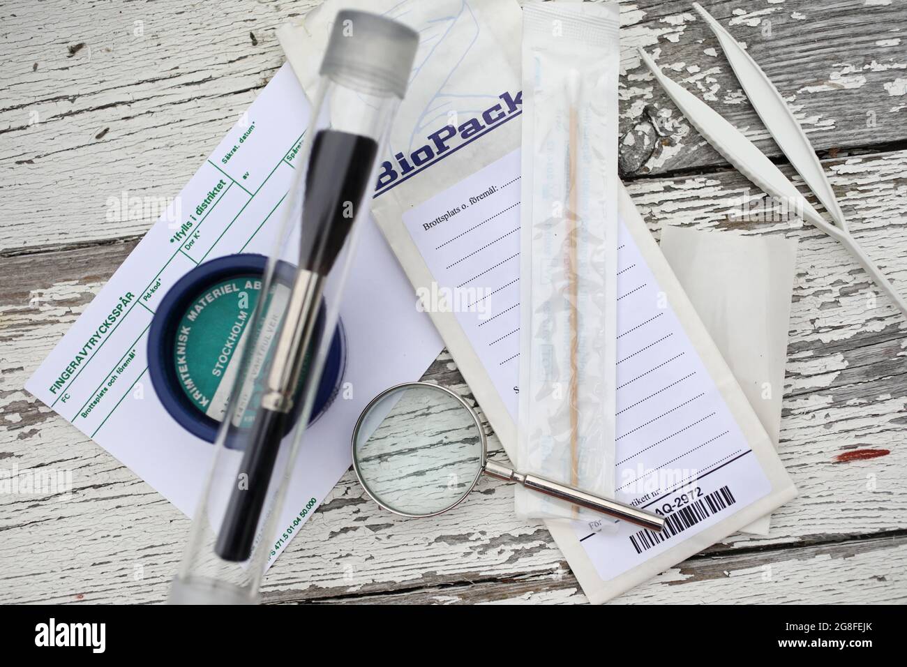 Forensic equipment for fingerprints, magnifying glass and bag for DNA ...